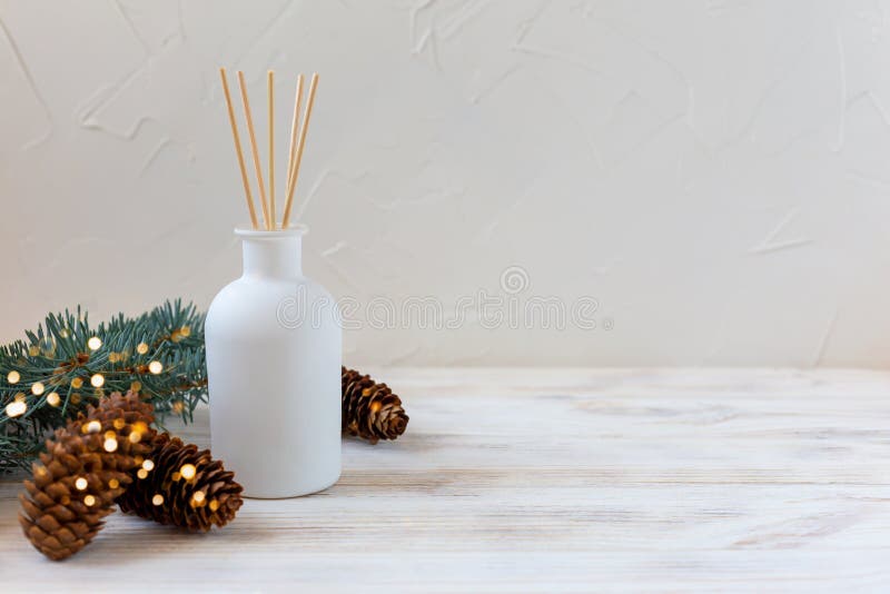Fragrant Reed Diffuser on a White Background with a Christmas Tree ...