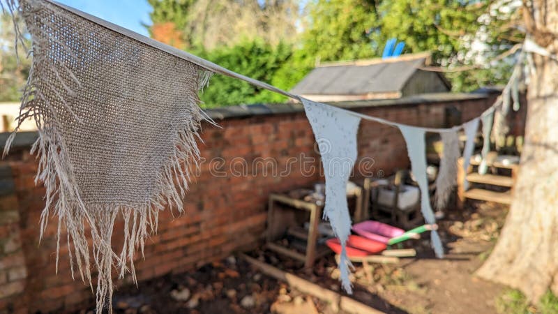 Fraid Worn Hessian Bunting Flags Hanging between Two Trees Stock Photo ...