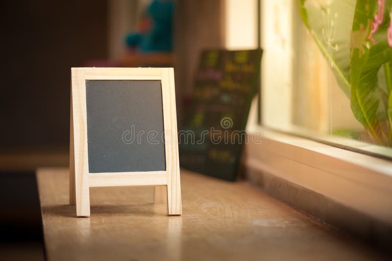 A-frame Black Board on Wood Bar Stock Image - Image of sale, education ...