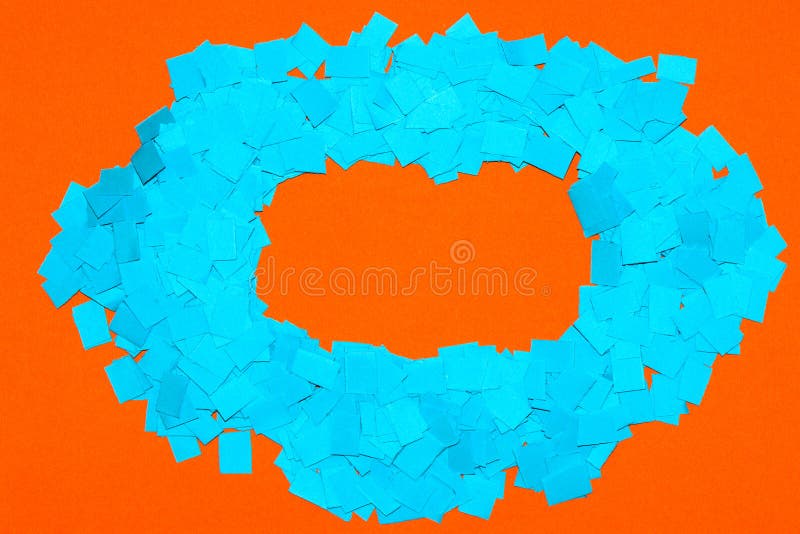 Frame of Chopped Blue Paper on Orange Background, Copy Space, Creative ...