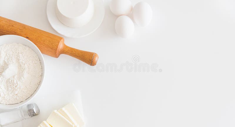 Frame of Cooking Cake Ingredients. Flour, Eggs and Butter on White ...