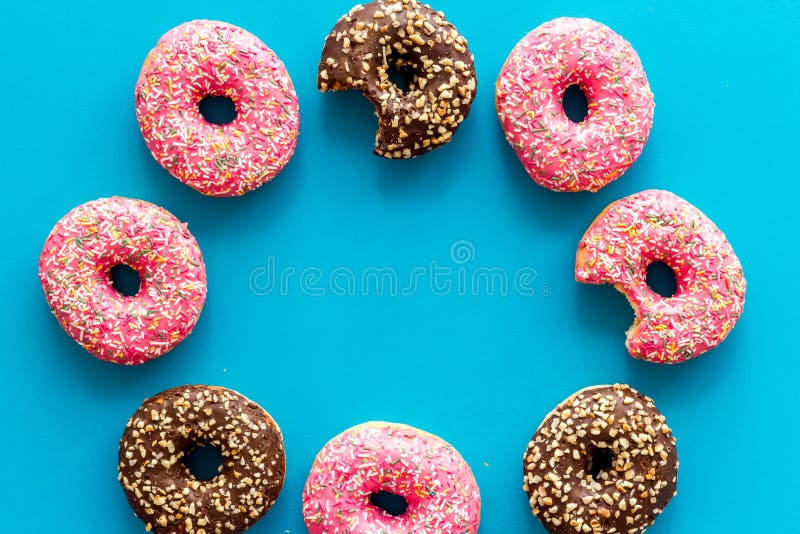 Frame of Donuts with Icing and Sprinkles, Overhead View. Colorful ...
