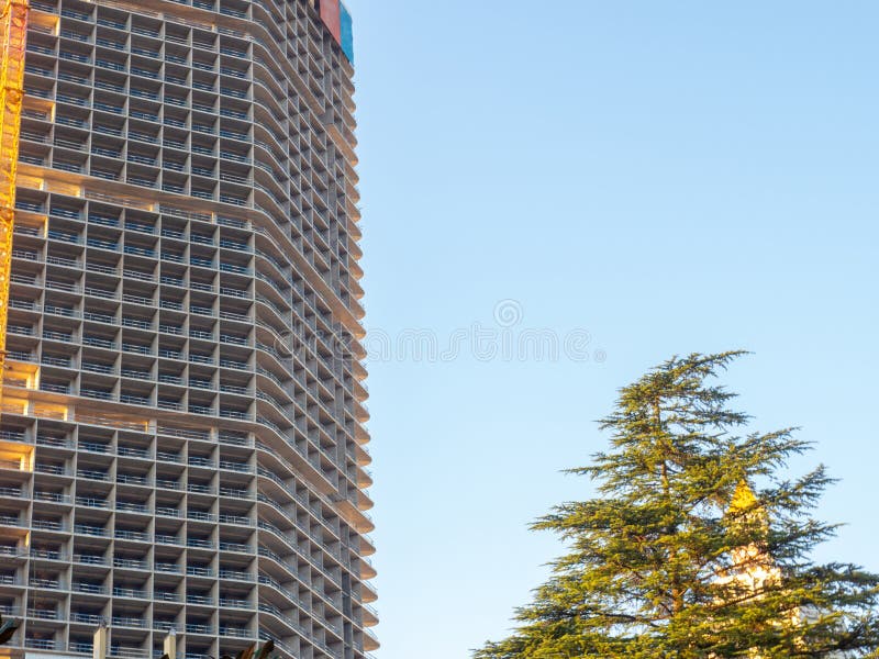The Frame of a High-rise Building Under Construction. Reinforced ...