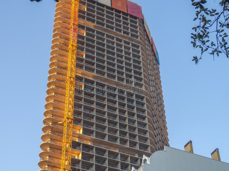 The Frame of a High-rise Building Under Construction. Reinforced ...