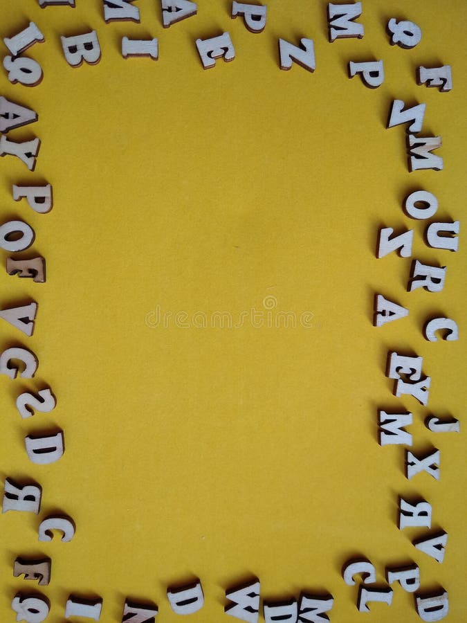 Frame of Letters on a Yellow Background with Space for Text Stock Image ...