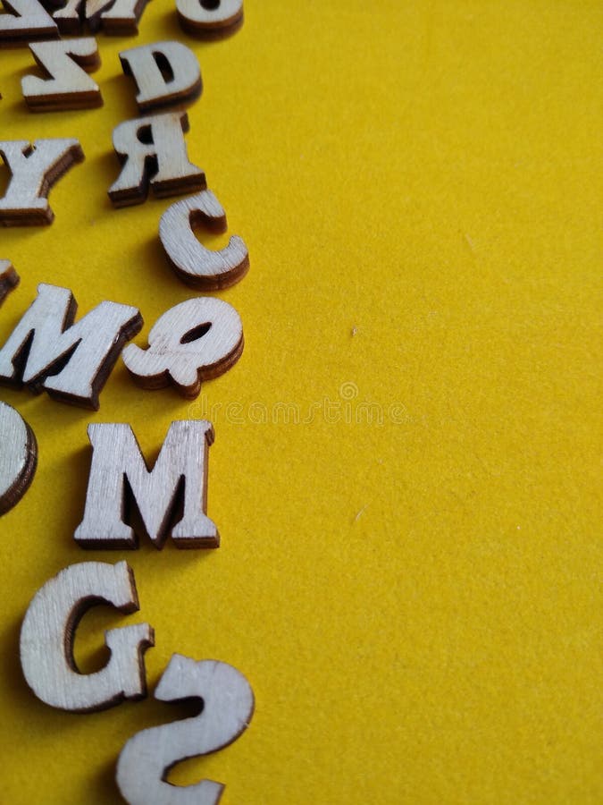 Frame of Letters on a Yellow Background with Space for Text Stock Photo ...