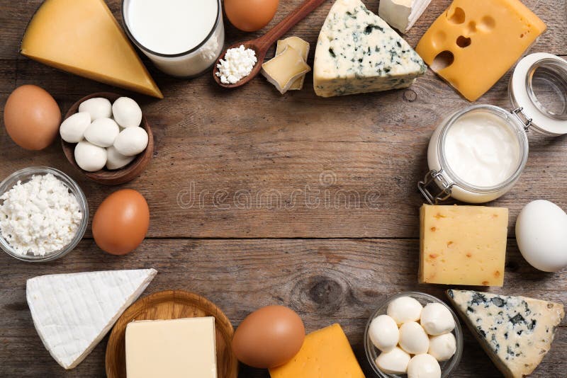 Frame Made with Different Delicious Dairy Products on Table, Top View ...
