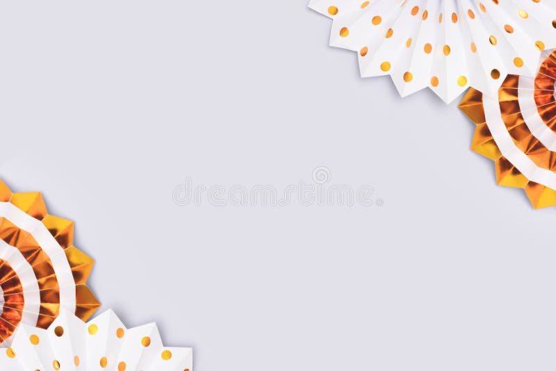 Frame Made of Gold Colored Paper Fans on a Blue Background. Stock Image ...