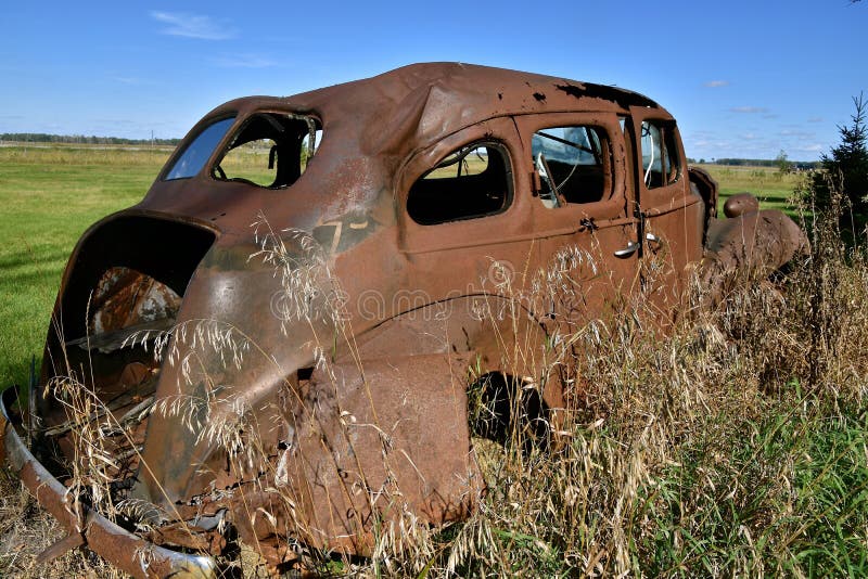 Frame of an old rusty car stock photo. Image of door - 100233082