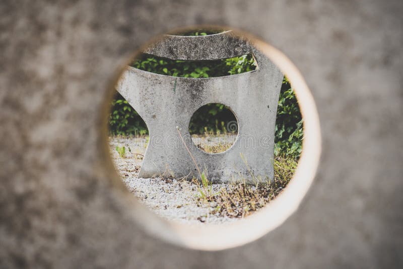 Frame within a Frame Shot of a Concrete Structure through a Round Frame ...
