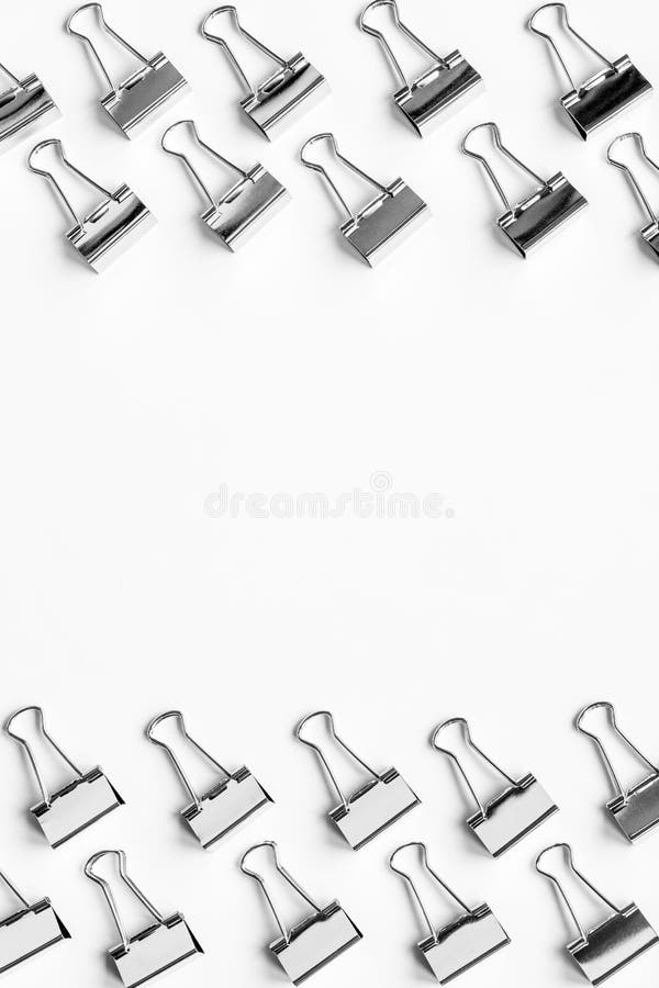 Frame of Silver Paper Binder Clips Top View. Office Supplies Pattern ...