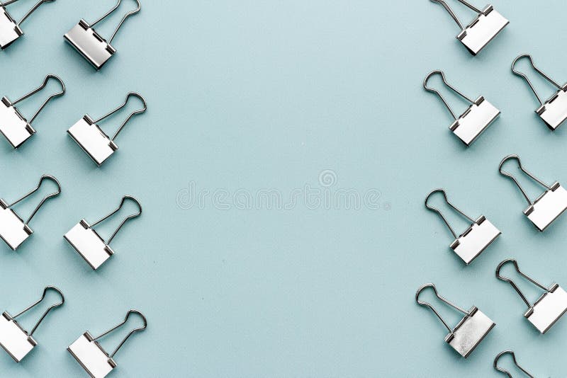 Frame of Silver Paper Binder Clips Top View. Office Supplies Pattern ...