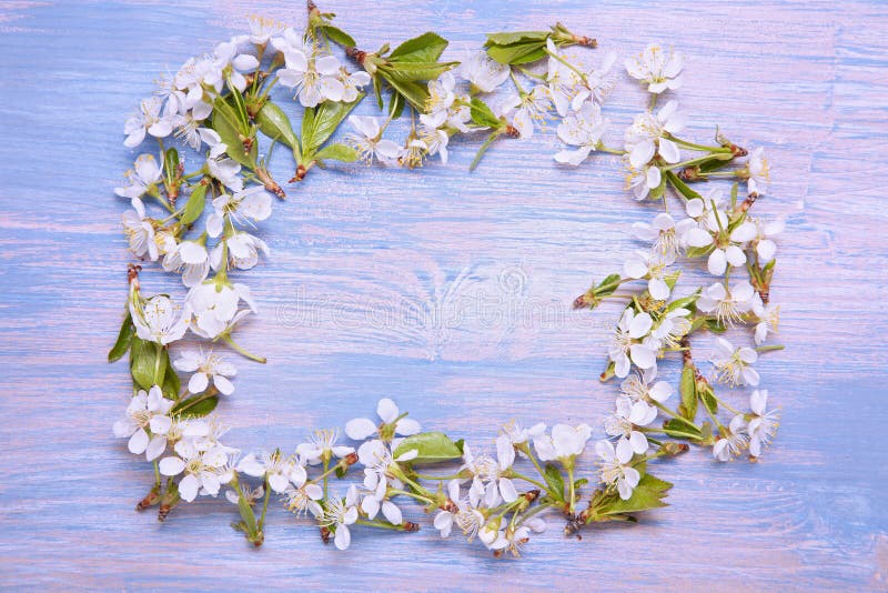 Frame of Spring Flowers on the Background of Old Vintage Blue Bo Stock ...