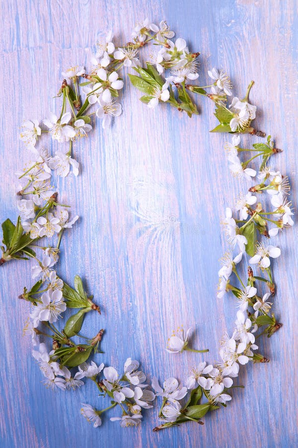 Frame of Spring Flowers on the Background of Old Vintage Blue Board ...