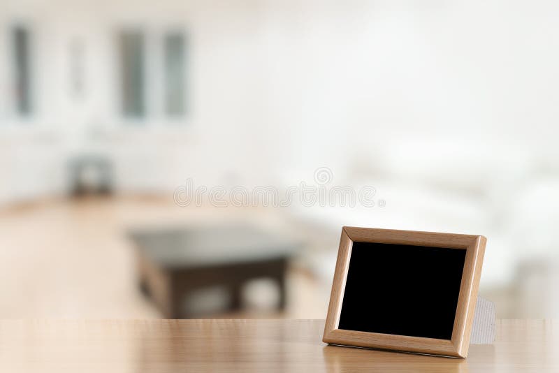 Frame on table stock image. Image of photoframe, stylish - 236771765