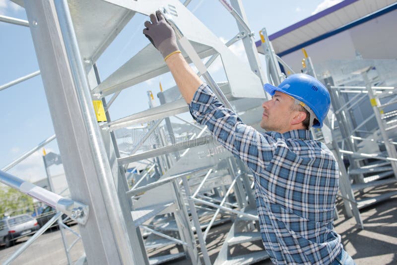 Frame worker in yard stock image. Image of structure - 88454637