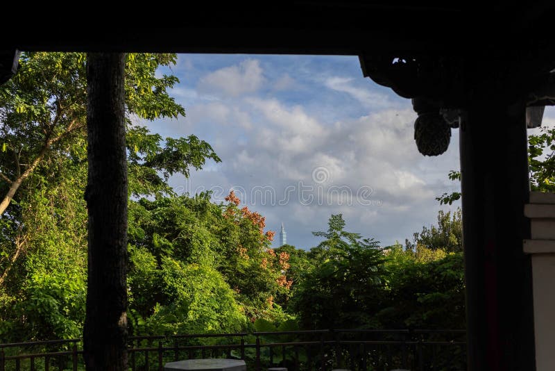 Framed View of Greenery and Distant Structure Stock Image - Image of ...