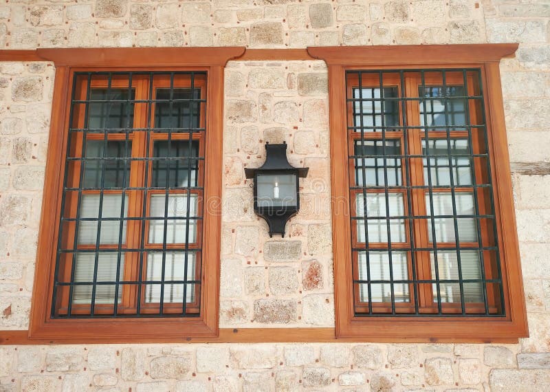 Framed Windows on the Stone Facade of an Old House Stock Image - Image ...