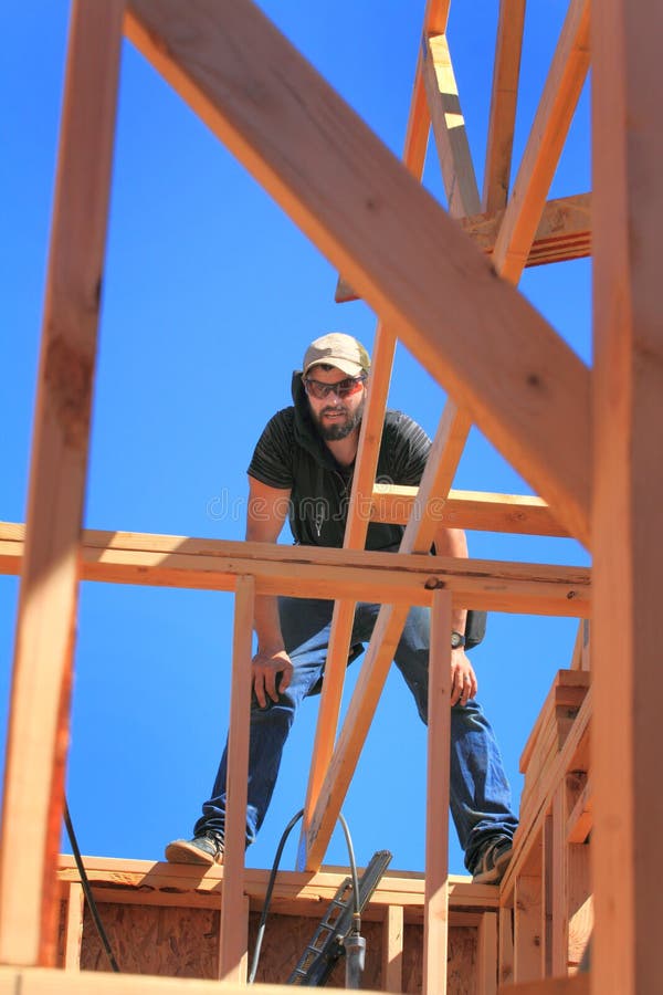 Framer Balances on Wall stock image. Image of common - 54373325