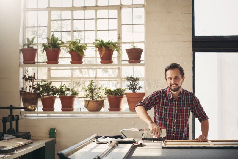 Framer in His Studio Working with a Tool on Workbench Stock Image ...