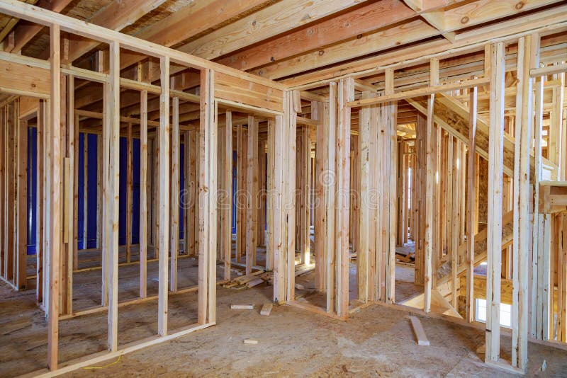 New Home Construction Framing of a House Under Construction Stock Photo ...