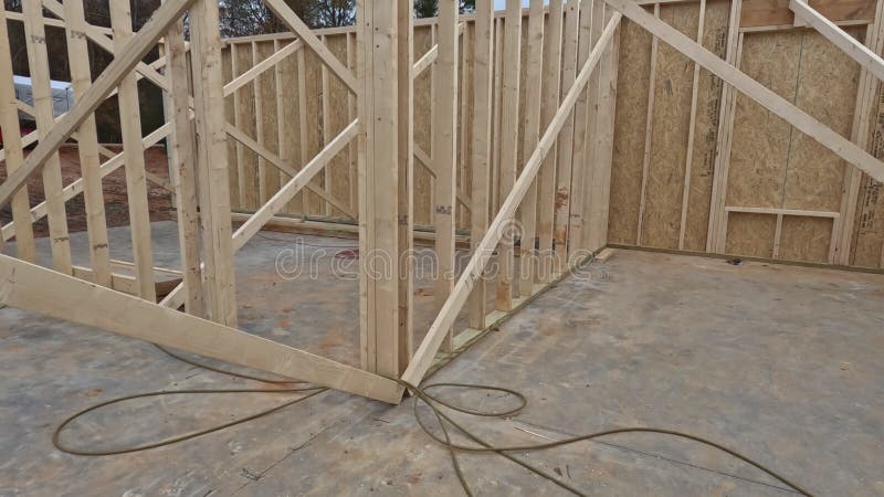 Framing Beams Stick Built New Home Under Construction with Aerial View ...
