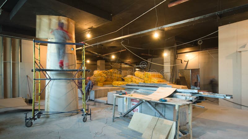 Framing Construction Contractor Installing Sub Siding on a Wood Frame ...