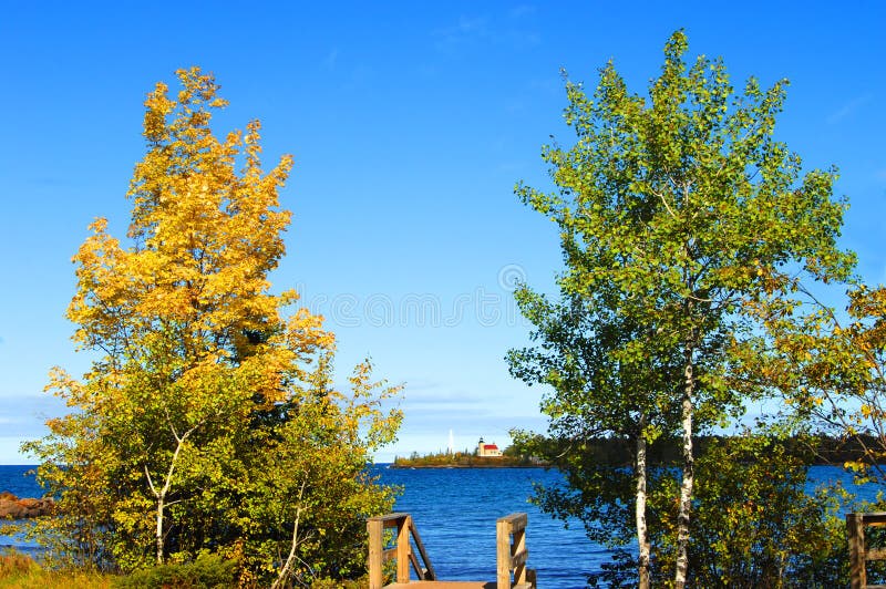 Framing Copper Harbor Lighthouse Stock Image - Image of superior, fall ...