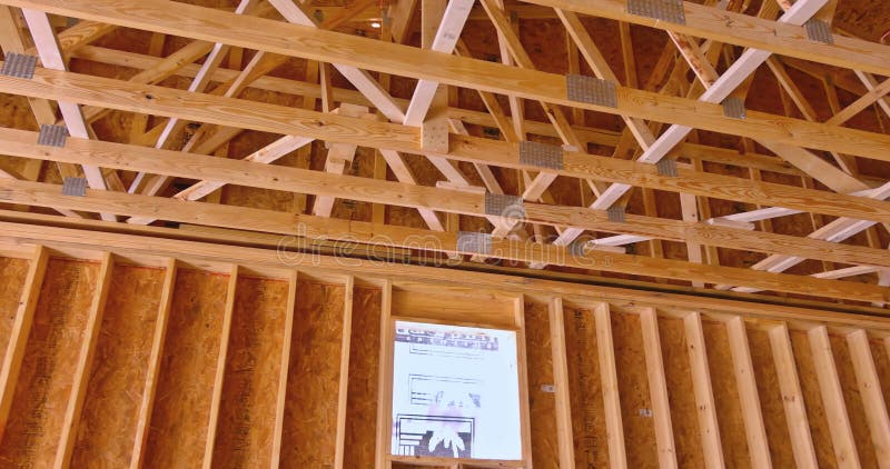 Framing for the Interior of a New House Under Construction, Truss Beams ...