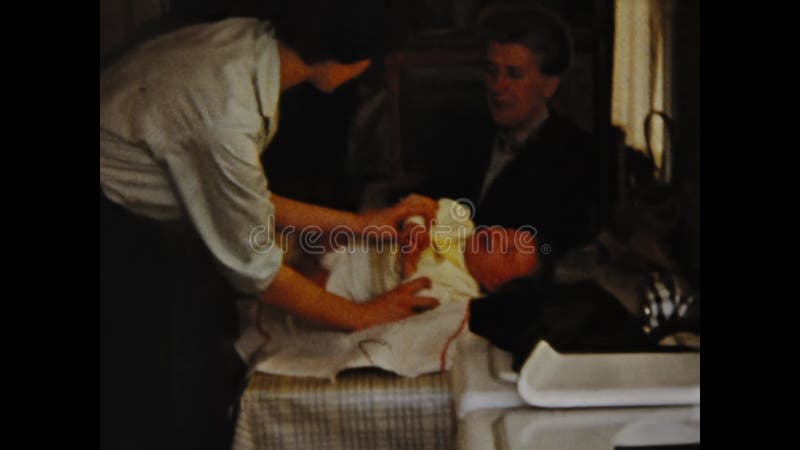 France 1969, Changing the Baby`s Nappy Stock Video - Video of family ...