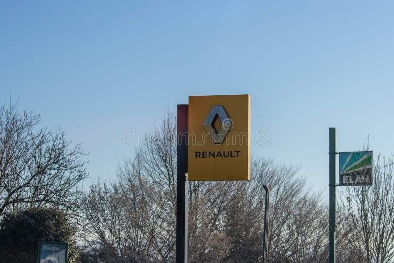 France, 31 December 2024 : Renault Sign with Trees and Clear Blue Sky ...