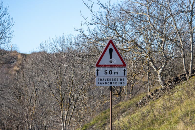 France, 01 January 2025 : Caution Sign on Road with Trees during ...
