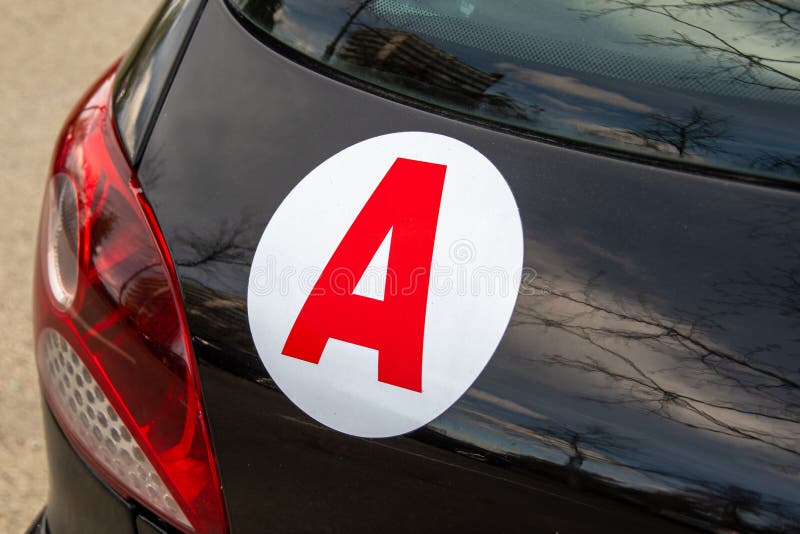 France: “a” Sticker Disc (for “Apprentice”) on the Back of a Car Stock ...