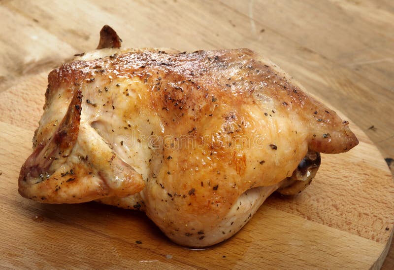 Frango Assado siciliano stock image. Image of cooked - 260770855