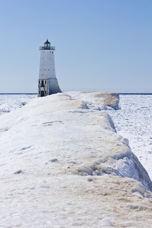 Frankfort Lighthouse in Ice Stock Image - Image of snow, pier: 39287651