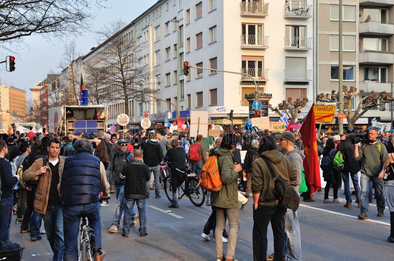 FRANKFURT, GERMANY - MARCH 18, 2015: Crowds of Protesters, Demon ...
