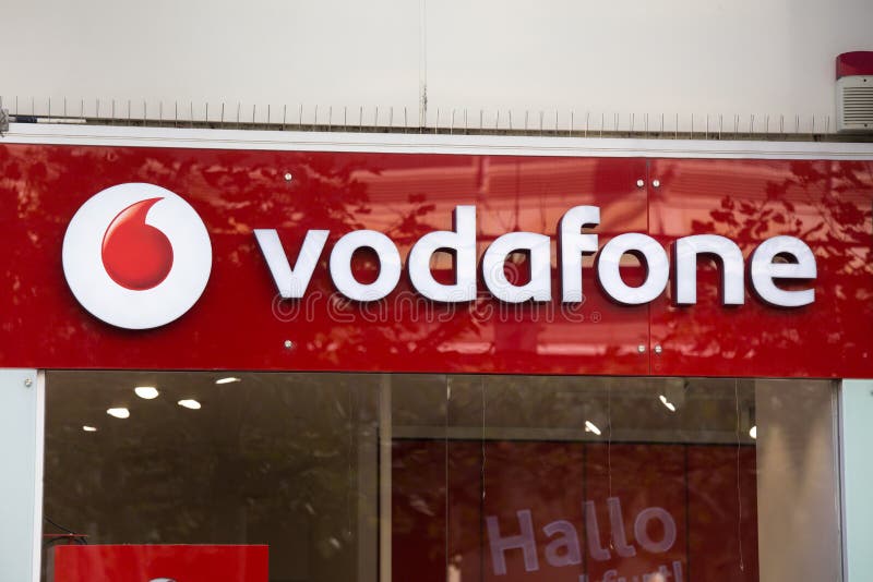 Vodafone sign and shop editorial photography. Image of public - 164882912