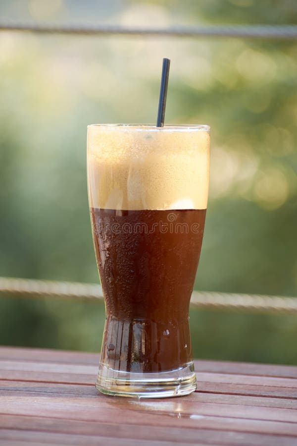Frappe in a Glass on the Table 2 Stock Photo - Image of cream, brown ...