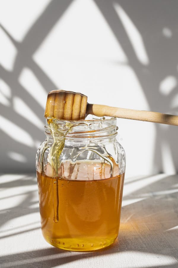 Frasco De Vidro Com Mel Cru De Abelhas Imagem de Stock - Imagem de ...