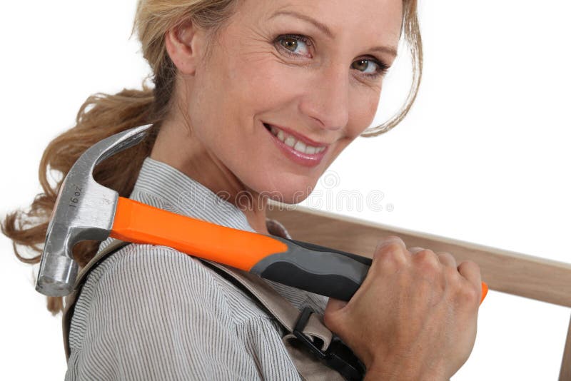 Frau mit Hammer stockbild. Bild von arbeit, frau, gesicht - 26796357