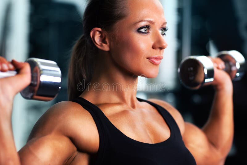 Frauenbodybuilder stockbild. Bild von menschlich, blau - 42151365