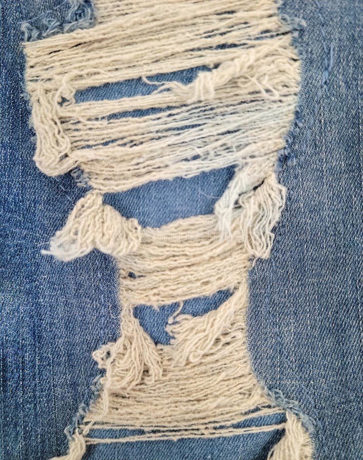 Frayed Blue Denim Fabric stock photo. Image of background - 239646062