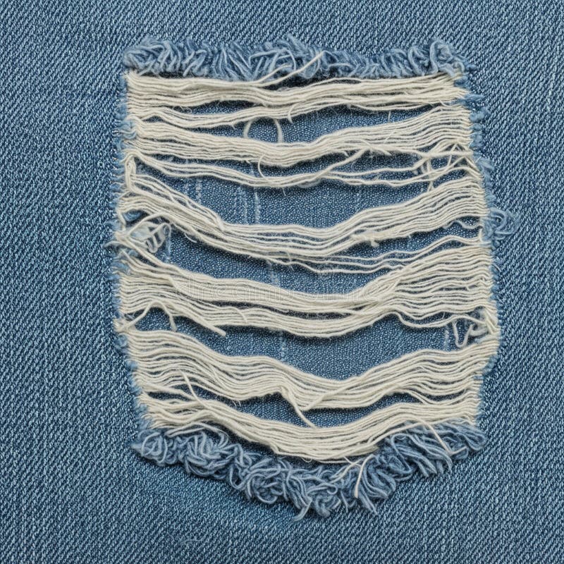 Frayed Denim Patch with Horizontal White Threads on Blue Fabric. the ...