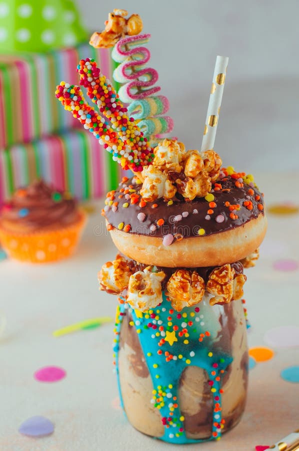 Freak Shake Topping with Chocolate Donut and Sweets Stock Image - Image ...