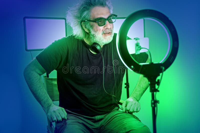 Freaky Man Going Crazy Inside Colored Studio Surrounded Camera Stuff ...