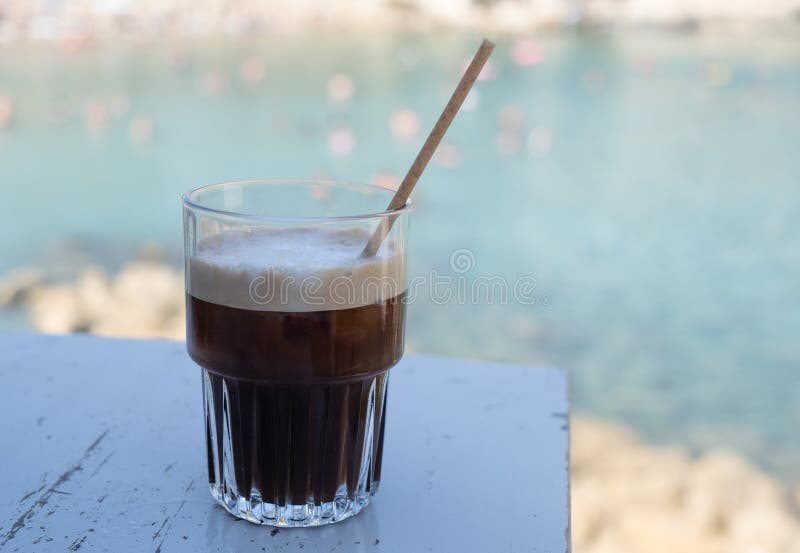 Fredo Espresso Iced Coffee on the Beach. Refreshment Outdoor Stock ...