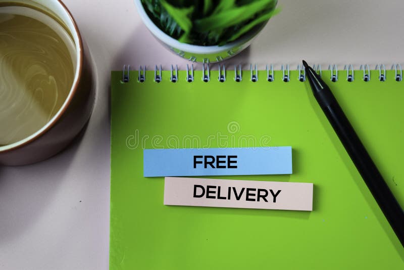 Free Delivery Text on Sticky Notes with Office Desk Concept Stock Photo ...