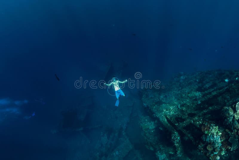 Free Diver Man in the Depth Make Ring Bubbles Near Shipwreck Stock ...