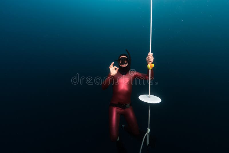 Free Divers Showing OK Sign Stock Photo - Image of immersion, woman ...