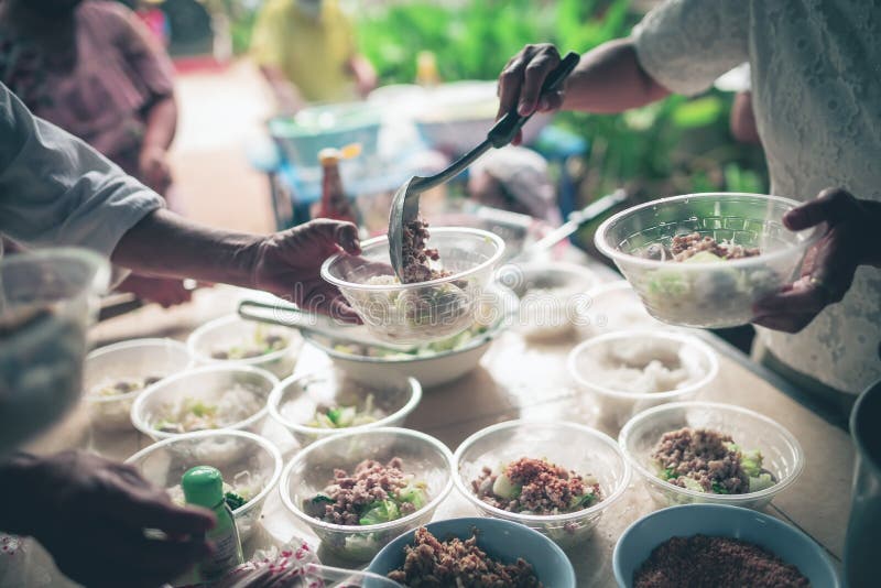 Free Food: the Human Need for Food is Assisted by Volunteers Stock ...